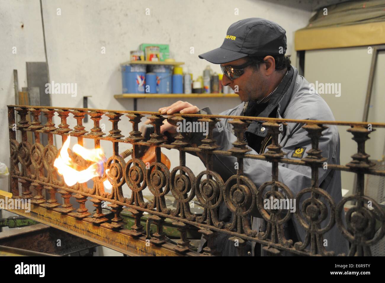blacksmith at work in his workshop Stock Photo - Alamy