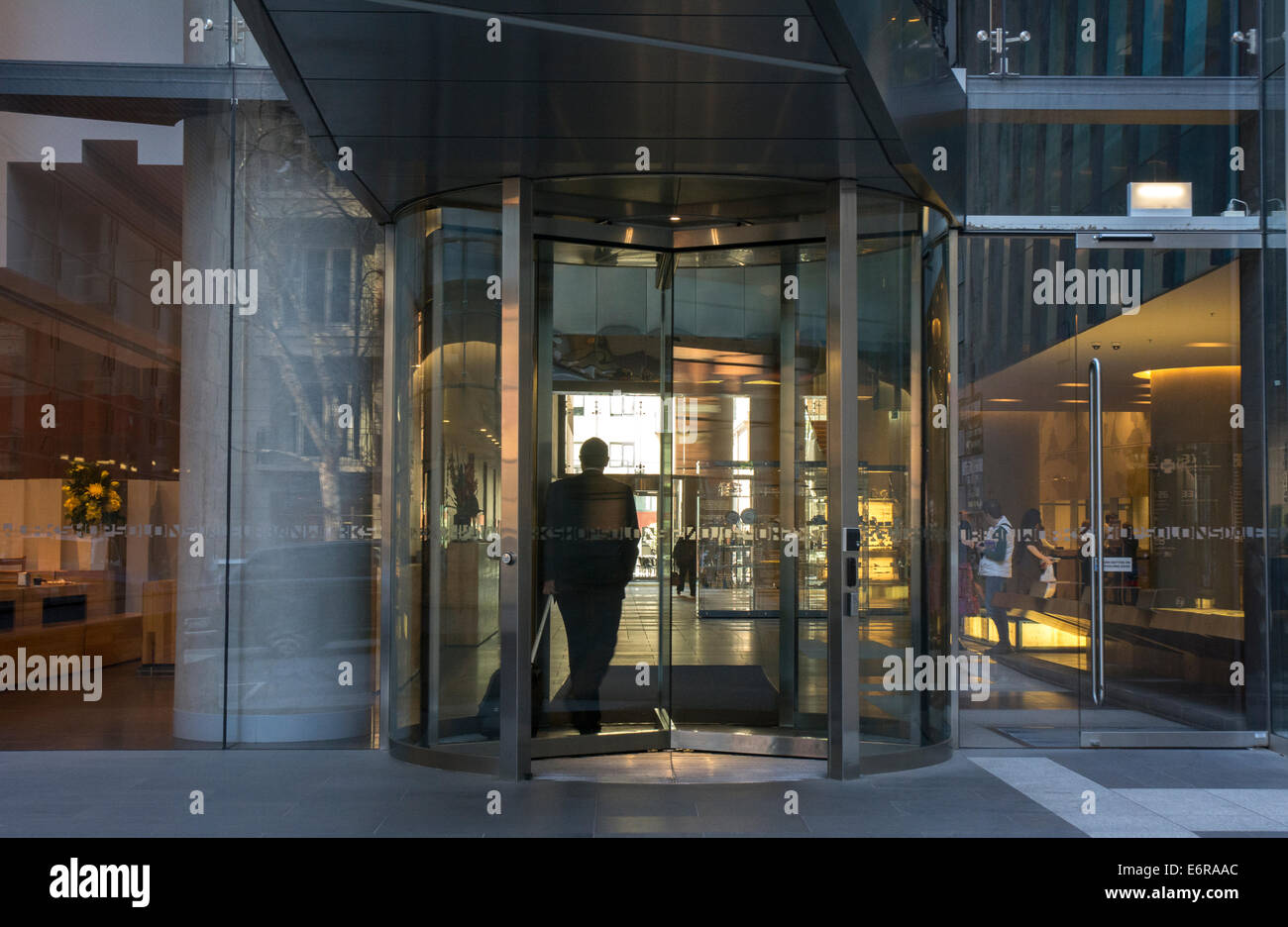 Revolving glass door entrance building hi-res stock photography and ...