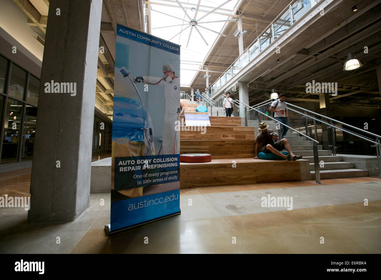 Students relaxing, walking in hallways of new campus of Austin ...