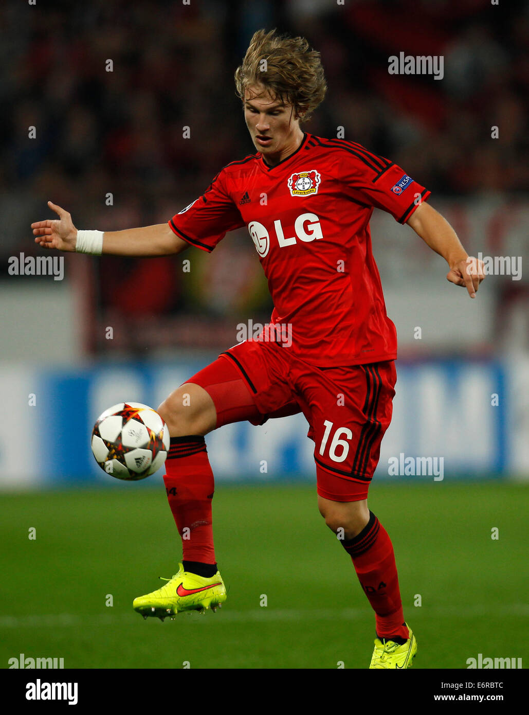 Leverkusen, Germany. 27th Aug, 2014. Leverkusen's Tin Jedvaj vies for ...
