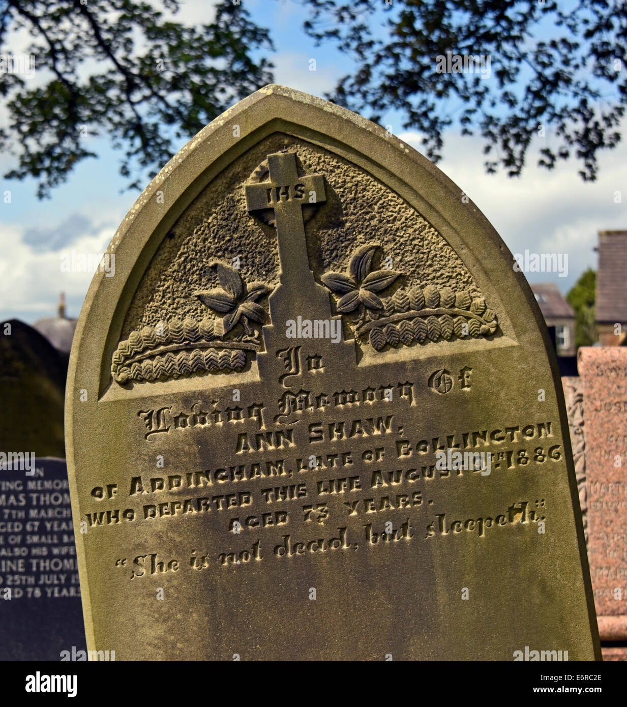 Gravestone with cross and floral design. Church of Saint Peter ...