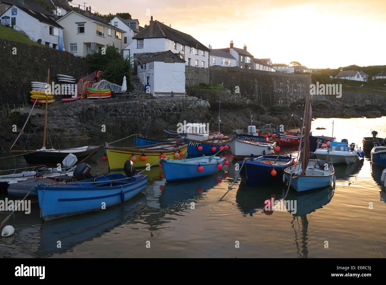 Boats and harbour at Coverack fishing village in Cornwall, England, UK ...