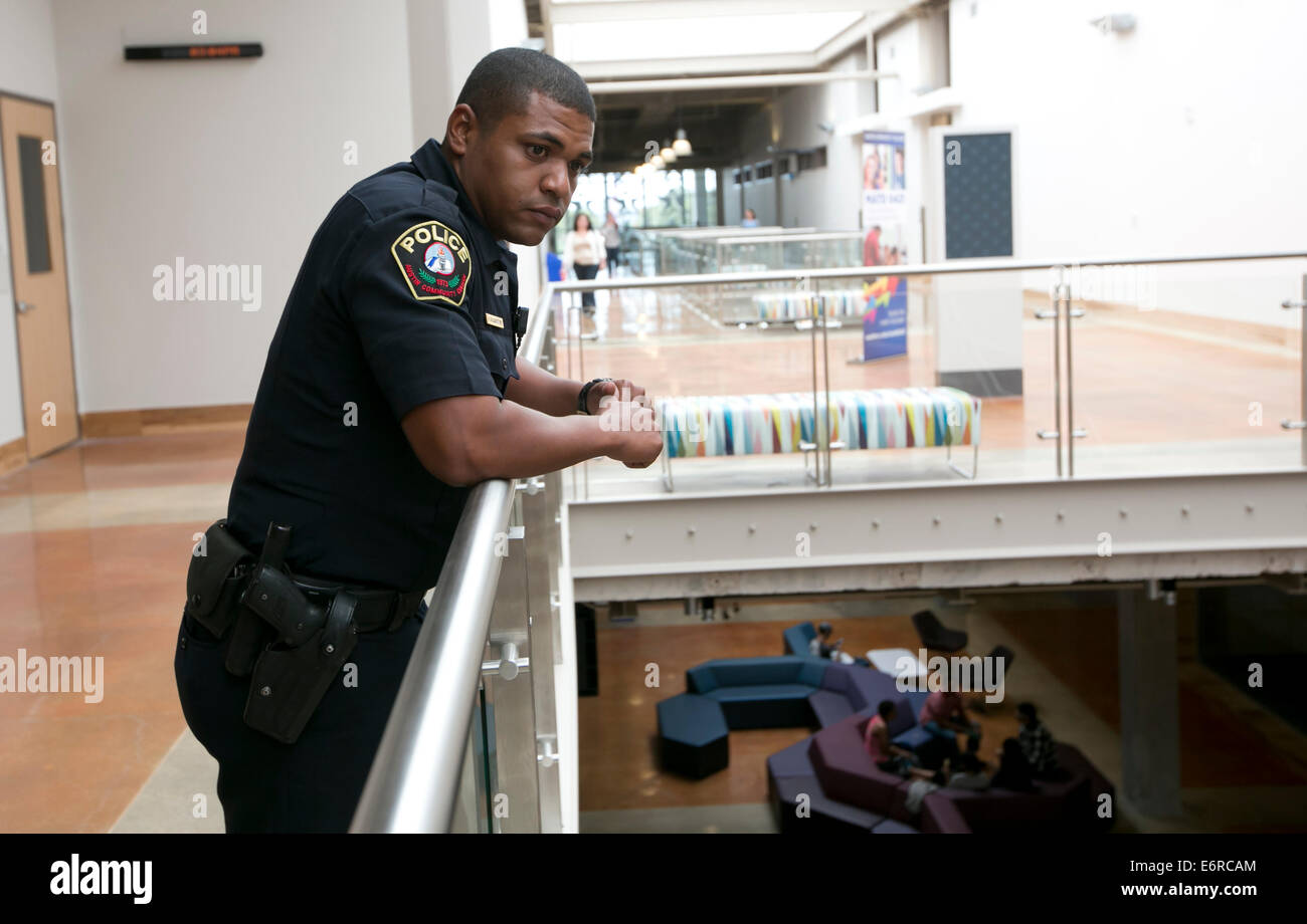 Austin Community College police officer patrols hallways, speaks to ...
