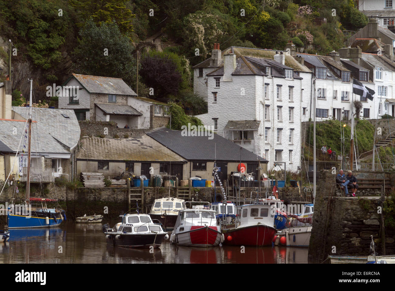 Polperro, Cornwall, England, UK. Fishing boats in harbour Stock Photo ...