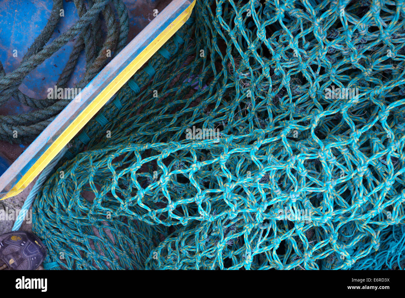 Fishing boat still life, showing nets, buoys and various trawler and ...