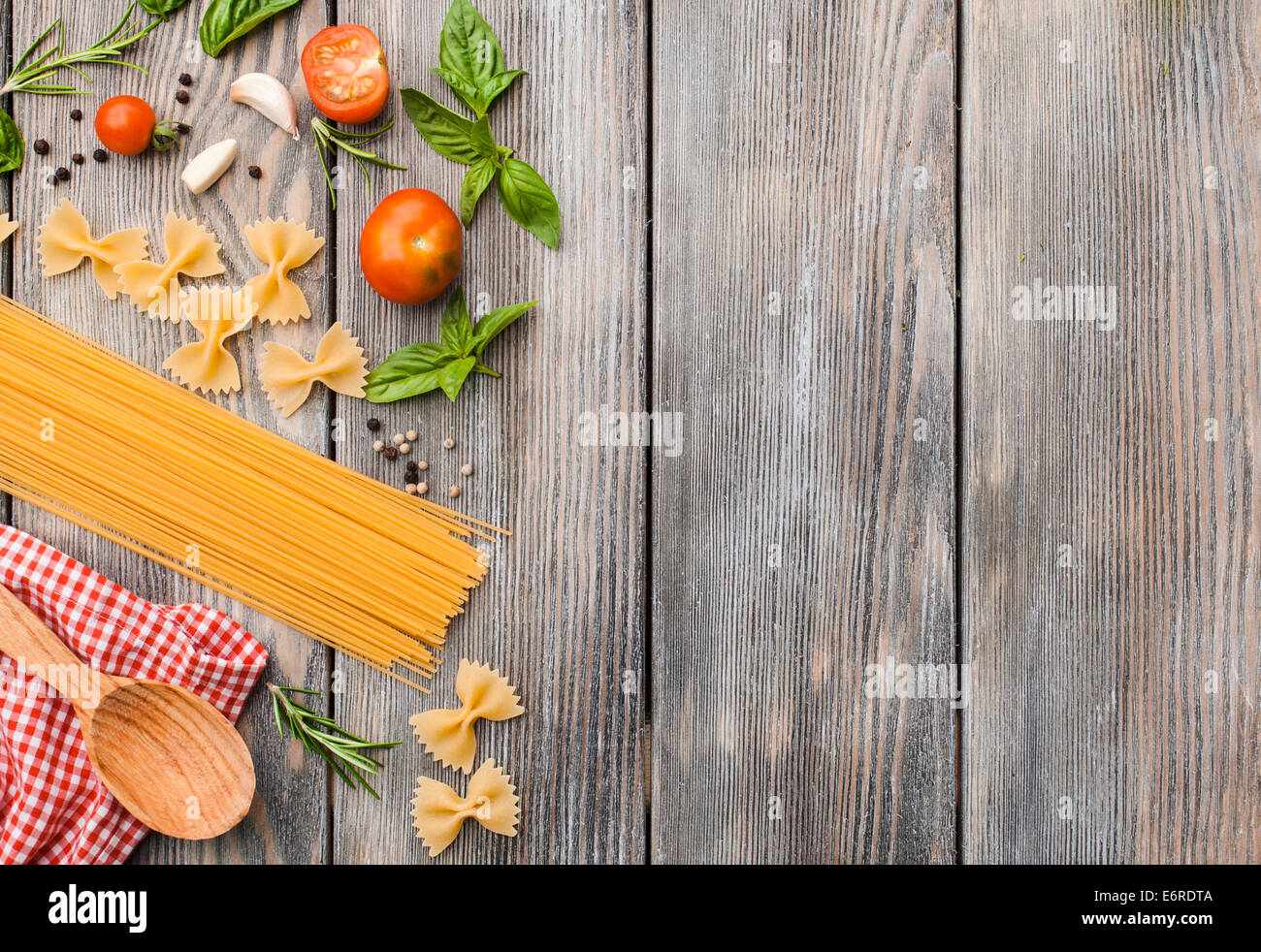 Raw Italian pasta with tomato sauce ingredients with copy space Stock ...