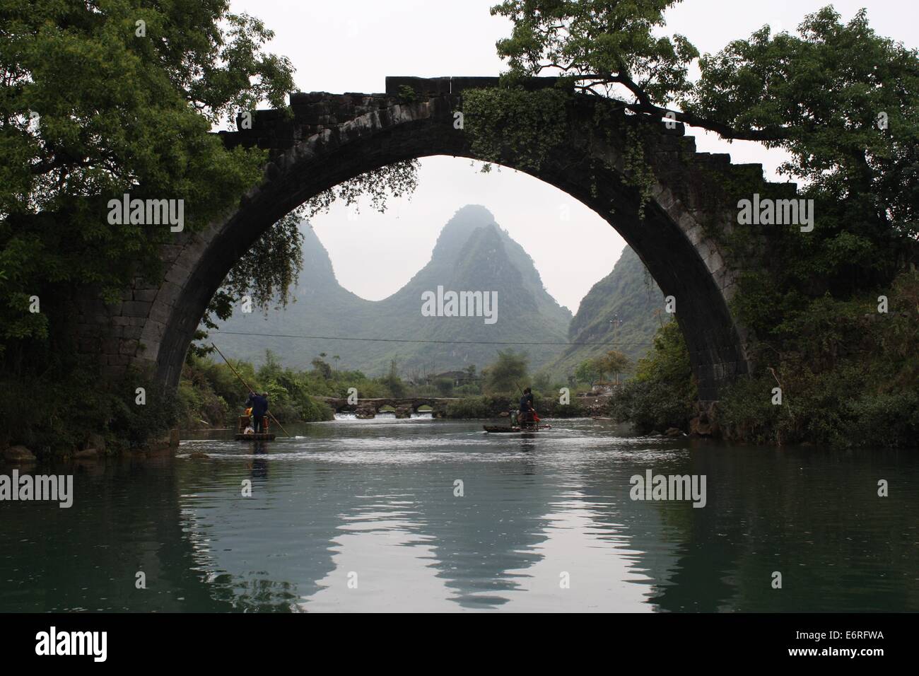 The Yulong Bridge: a 400-year-old stone bridge on the Yulong River in ...