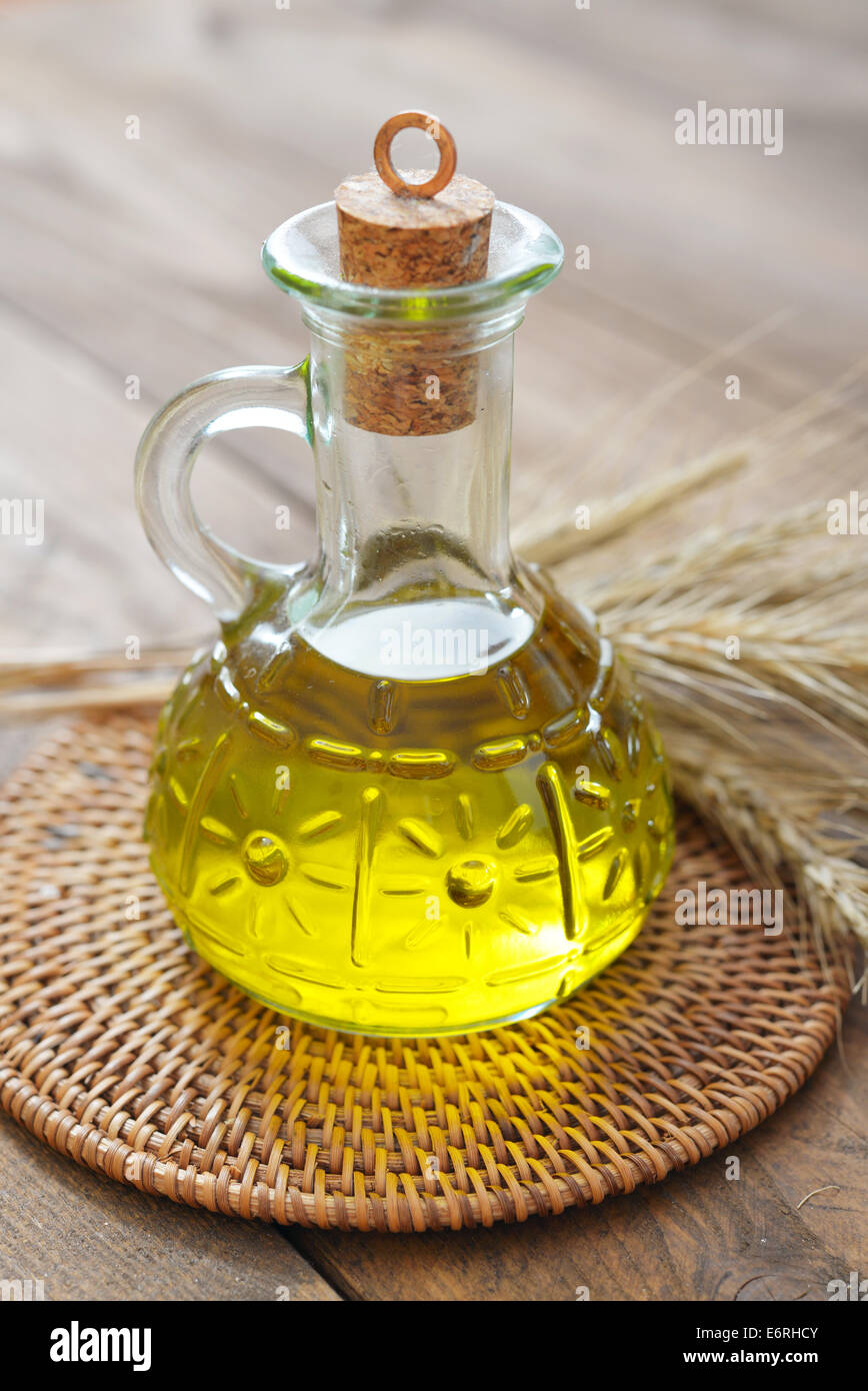 Wheat grain and wheat germ oil in bottle Stock Photo - Alamy