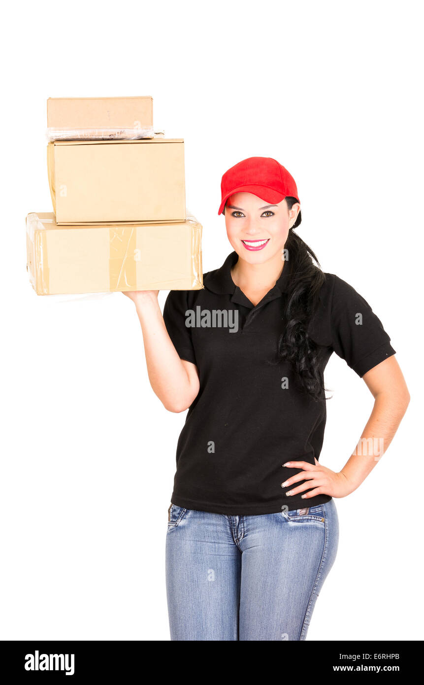 Beautiful smiling delivery girl holding packages Stock Photo - Alamy
