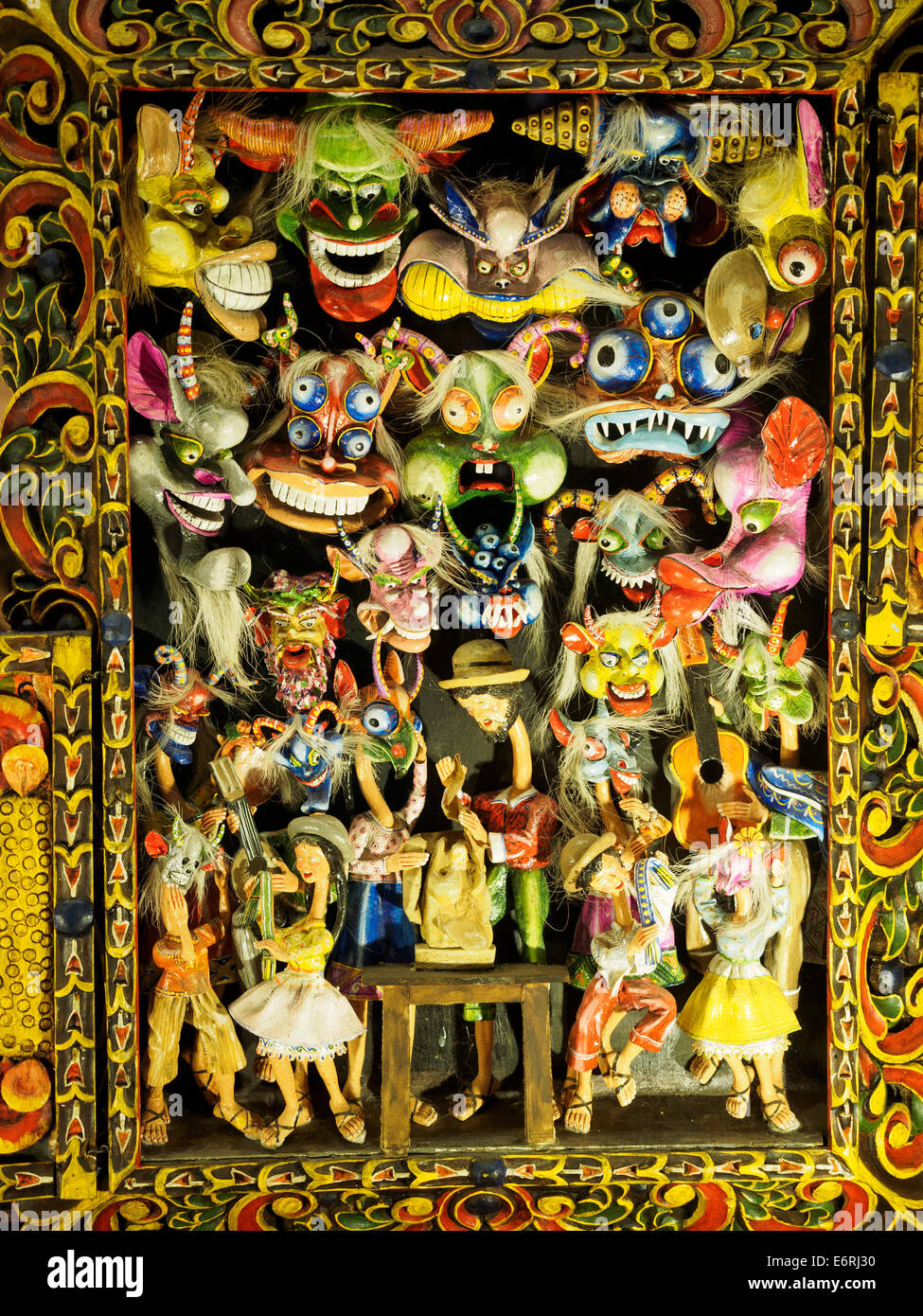 Coloured monsters carved in wood - Cusco, Peru Stock Photo - Alamy