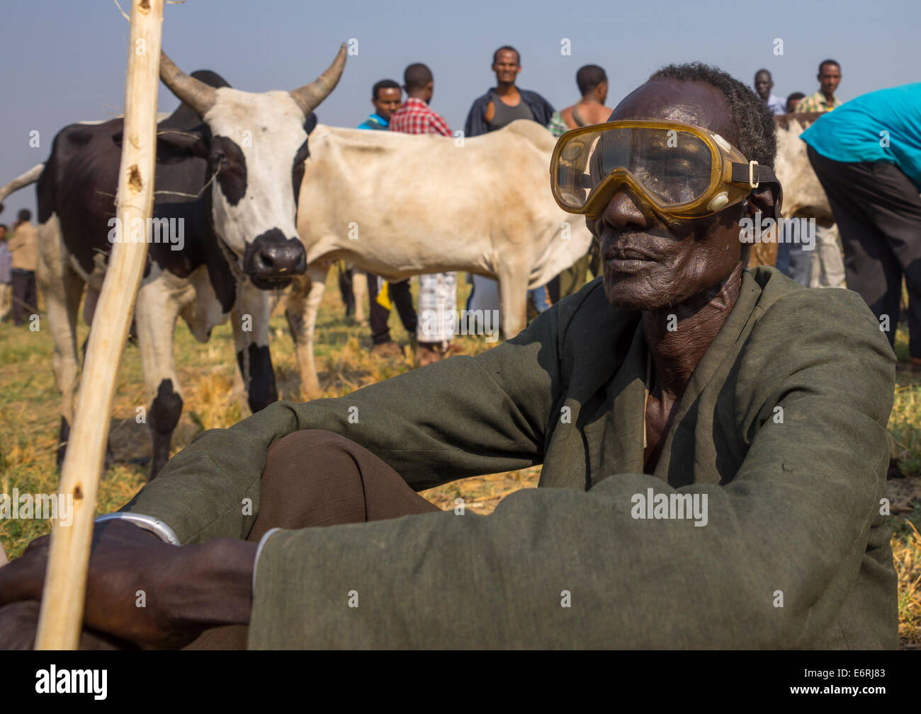 Nuer Tribe Man With A Diving Mask As Sunglasses In A Market, Gambela ...