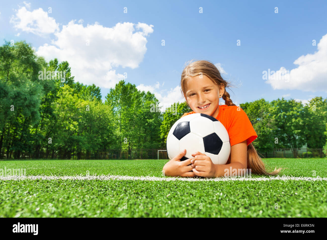 Female happy group soccer hug hi-res stock photography and images - Alamy