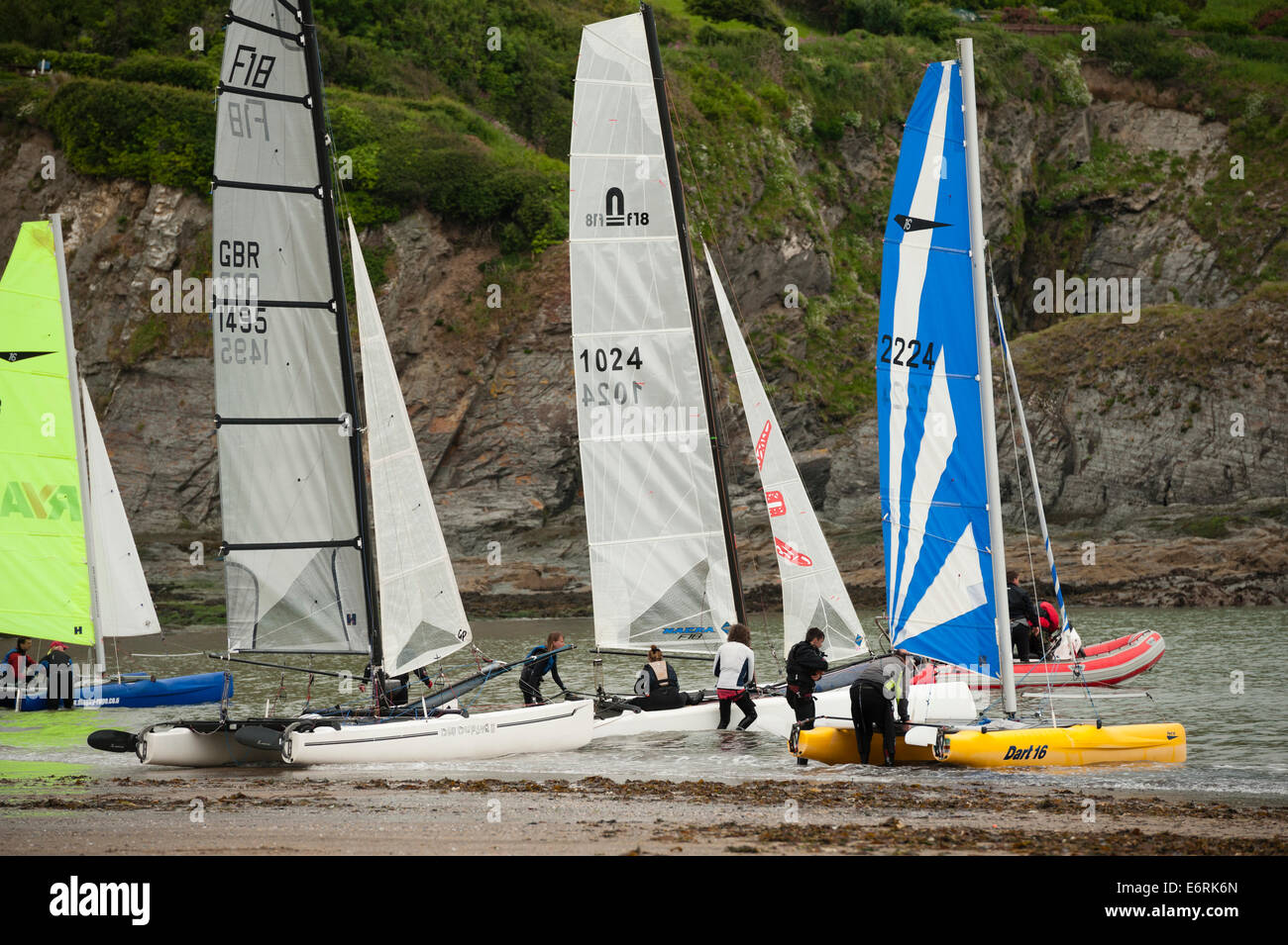 Racing catamarans being launched on the beach at Aberporth, Ceredigion ...
