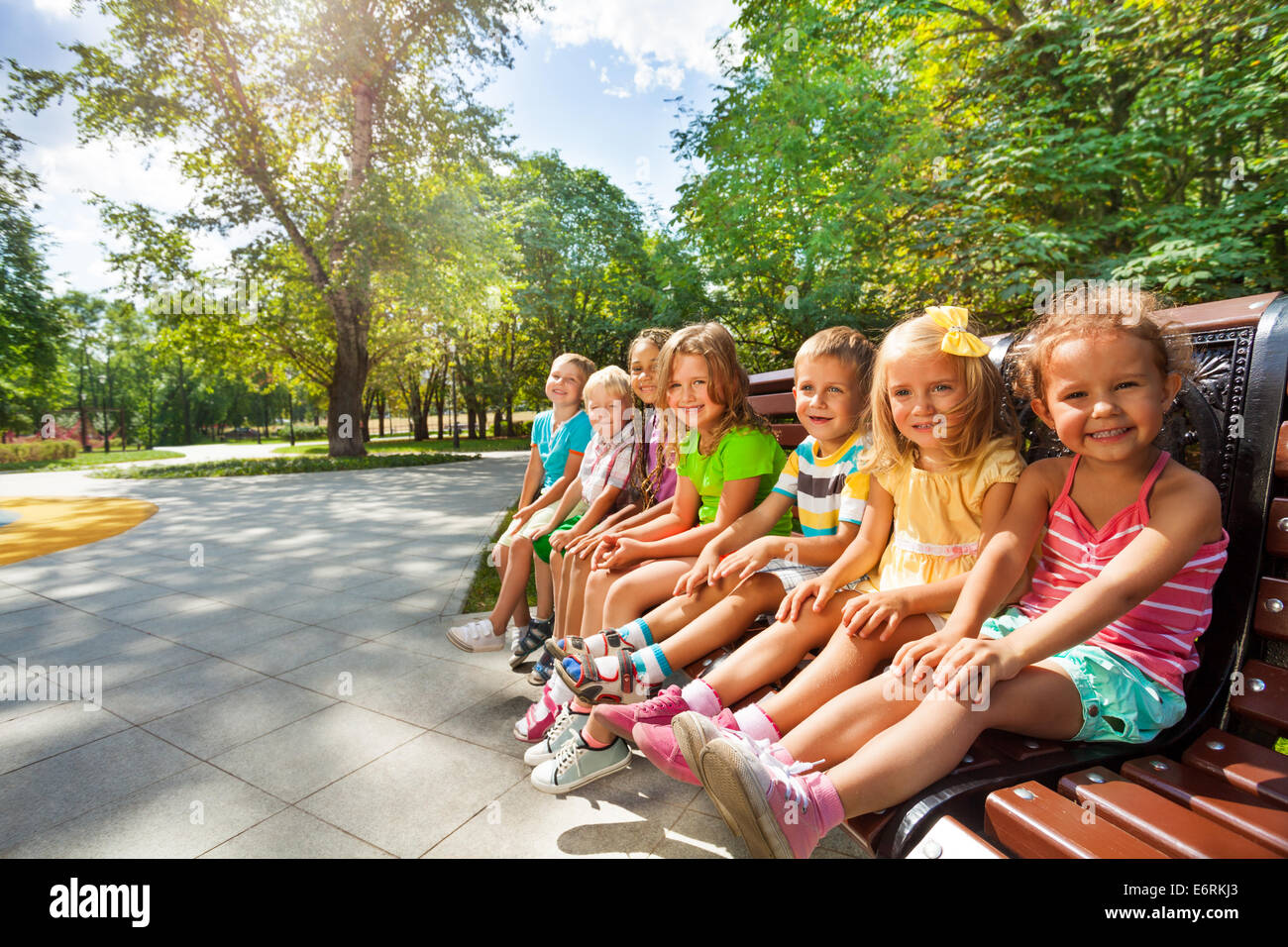 Kids park bench hi-res stock photography and images - Alamy