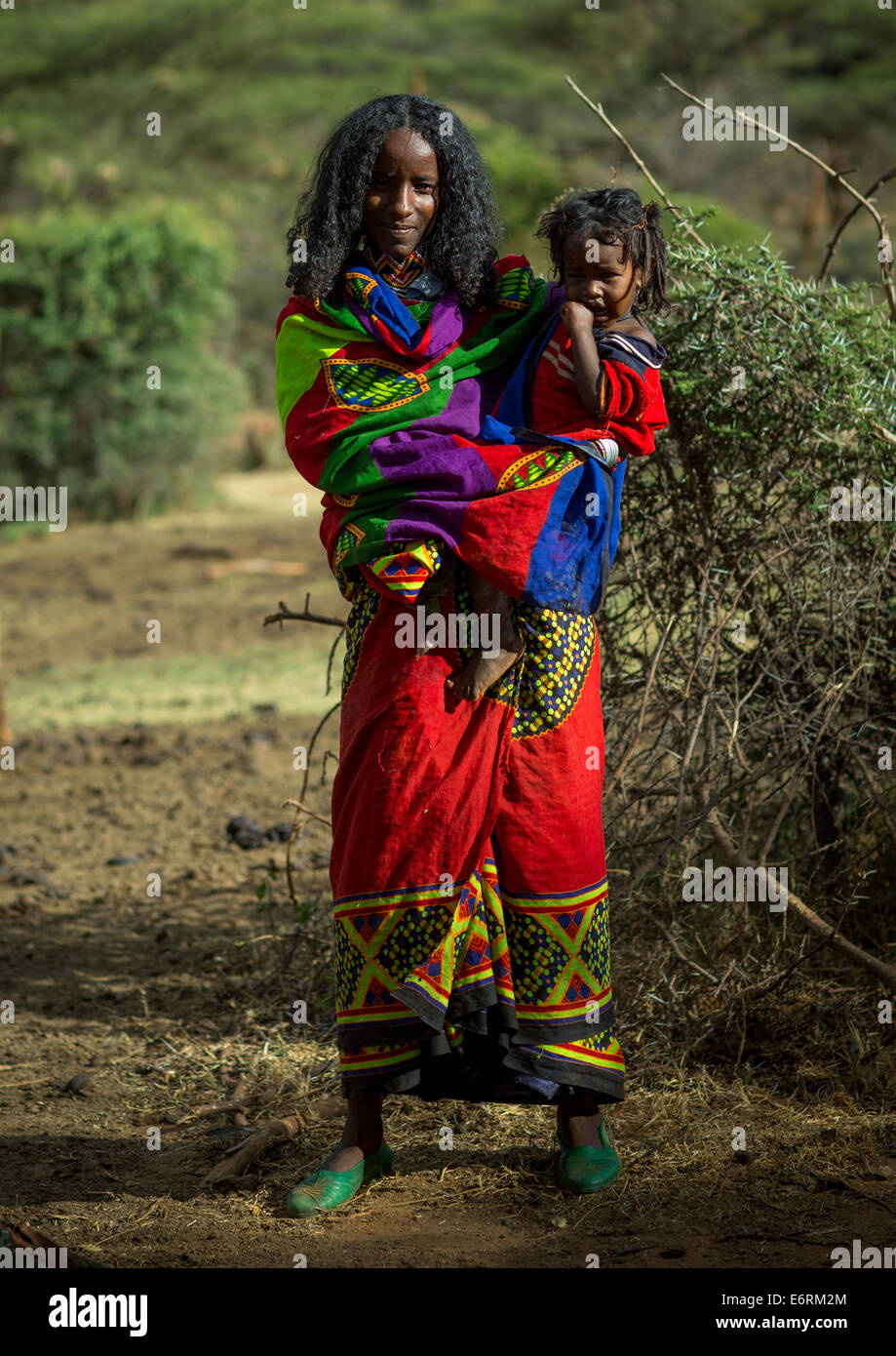 Borana Tribe Mother Carrying Her Baby, Yabelo, Ethiopia Stock Photo - Alamy
