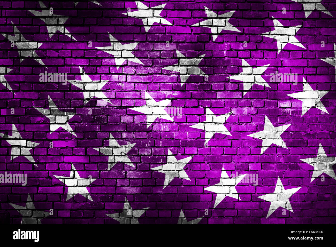 Old grunge brick wall with stars symbols Stock Photo - Alamy