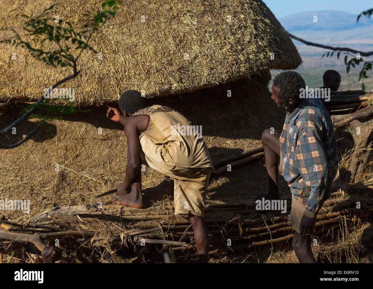 Konso Tribe Men Building A Mora, The Common House, Konso Village, Omo ...
