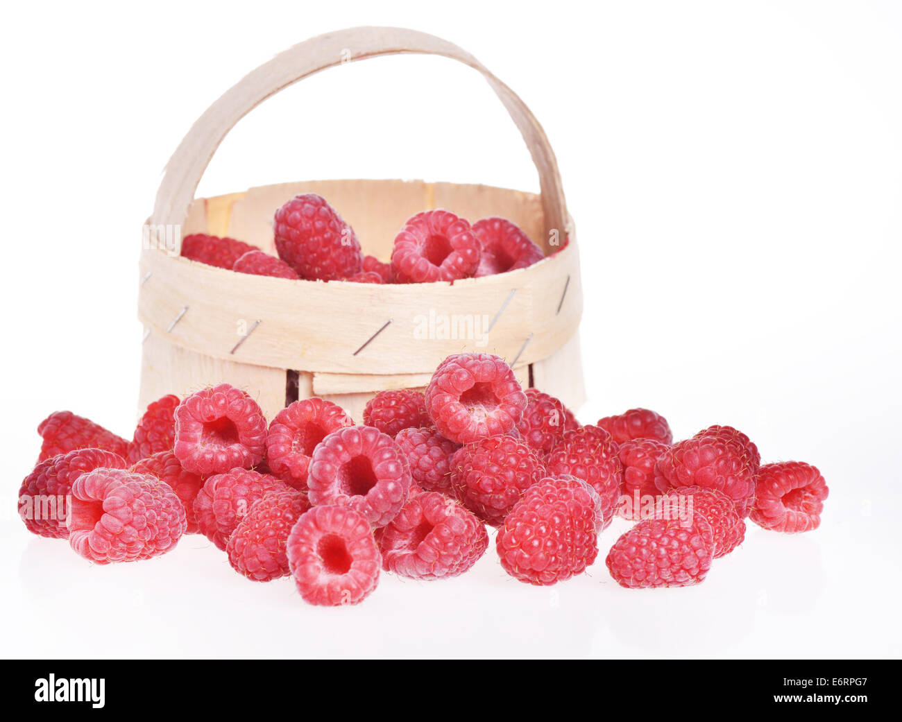 Very tasty summer raspberries in wooden basket Stock Photo - Alamy
