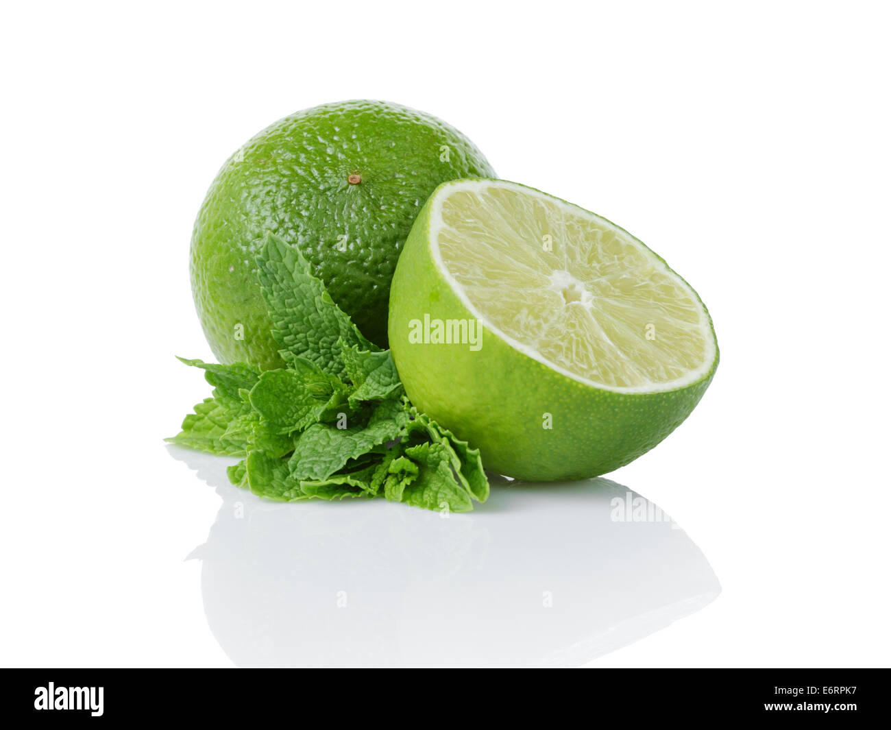 ripe limes with half and mint, isolated on white background Stock Photo ...