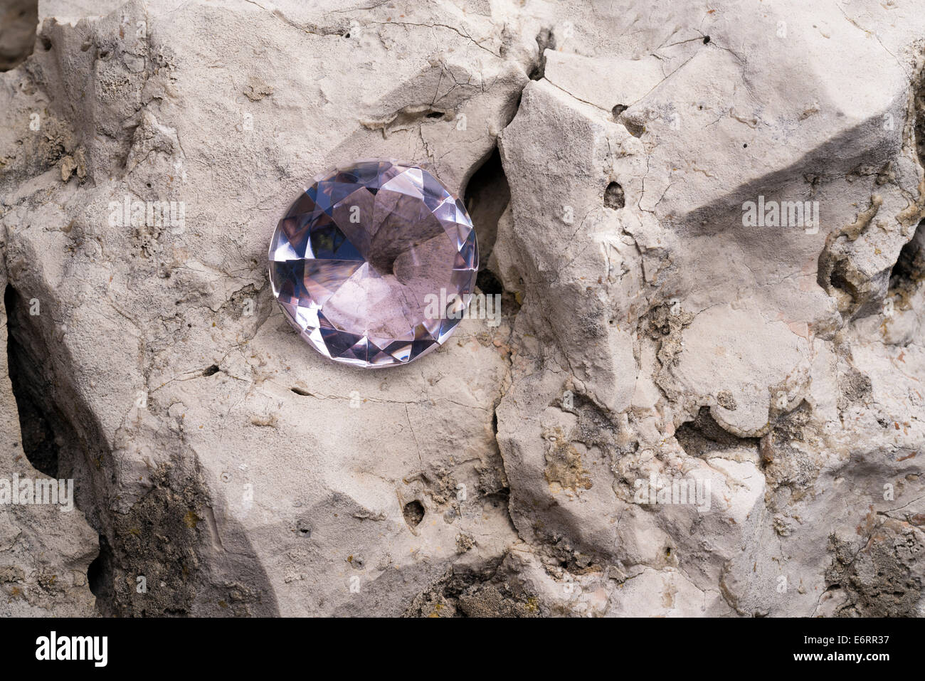 diamond shaped glass on a rock Stock Photo - Alamy