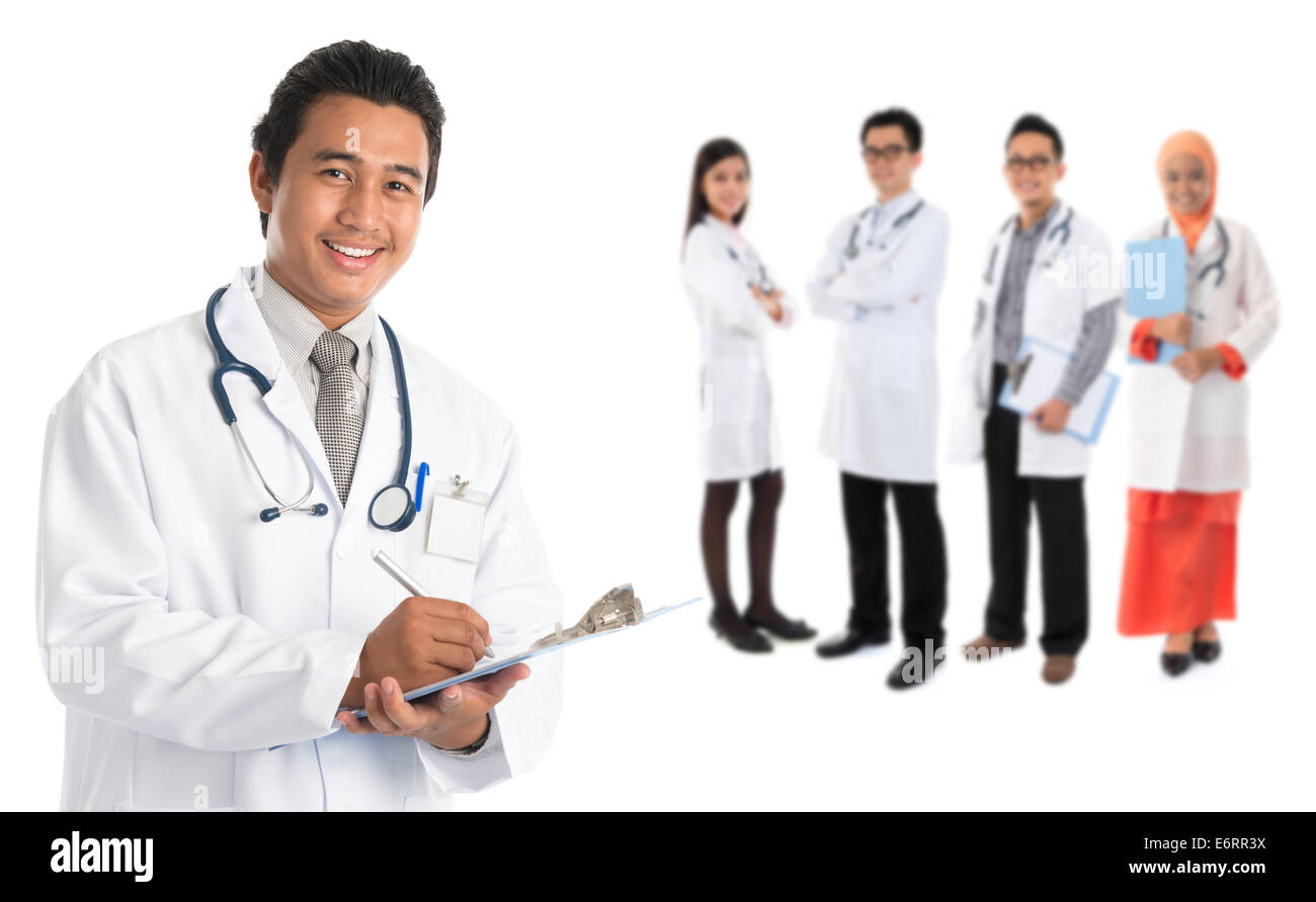 Group of southeast Asian doctors standing isolated on white background ...