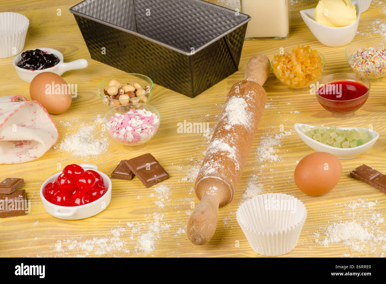Messy table full of ingredients for homemade cupcakes Stock Photo - Alamy