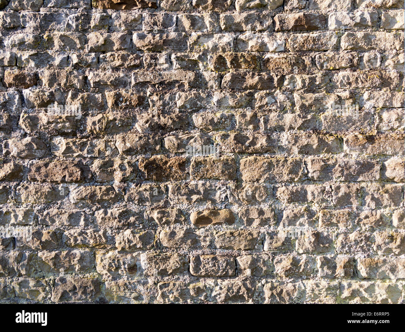 A section of mortared stone wall Stock Photo - Alamy