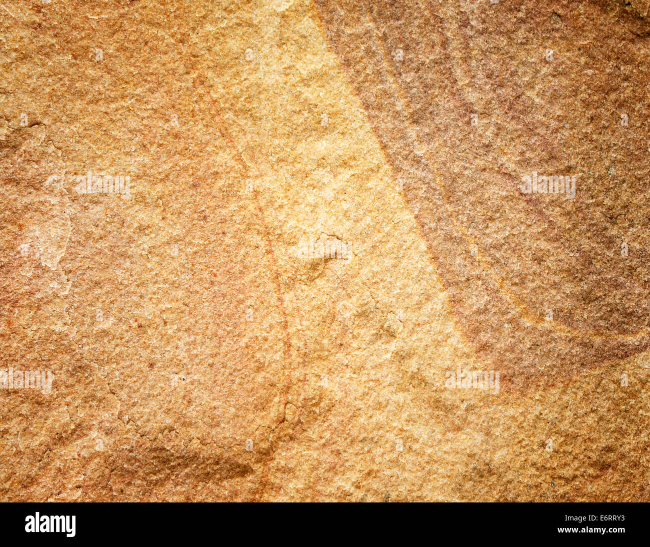 Polished yellow granite as a background wall Stock Photo - Alamy