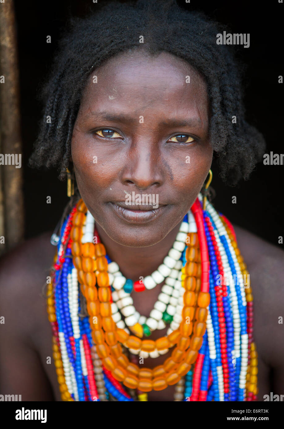 Portrait Of Beautiful Erbore Tribe Woman Wearing Beaded Necklace, Omo ...