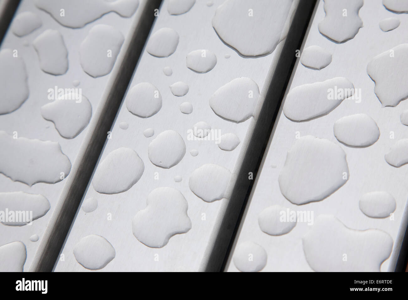 Rain Drops On Silver Diagonal Background Stock Photo - Alamy