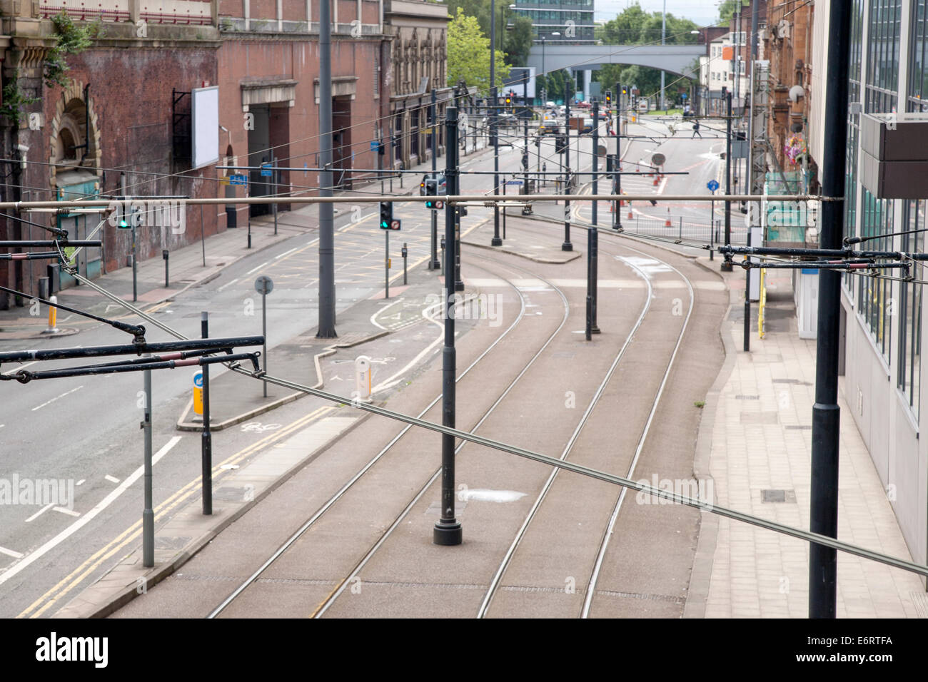Urban Scene with Tram Lines on Street Stock Photo - Alamy