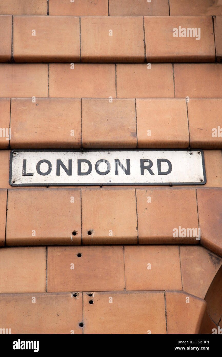 London Road Street Sign on Brick Wall Background Stock Photo - Alamy