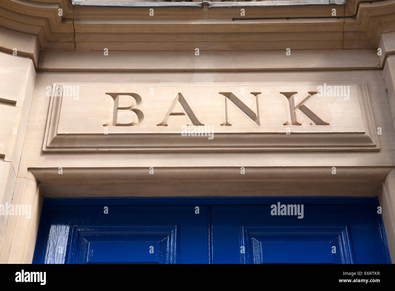 Closeup of Bank Sign on Yellow Stone Background Stock Photo - Alamy