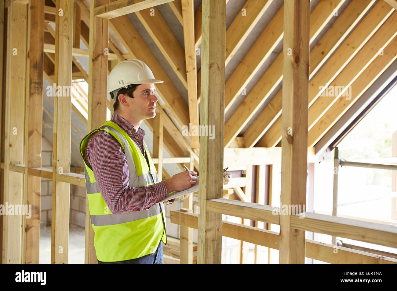 Building Inspector Looking At New Property Stock Photo - Alamy