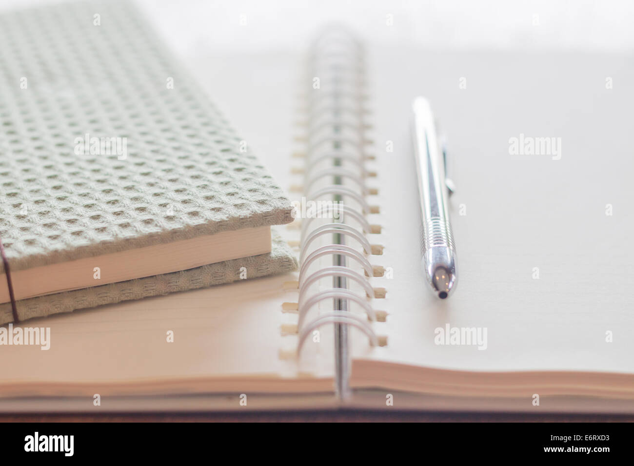 Green covered notebook pen hi-res stock photography and images - Alamy