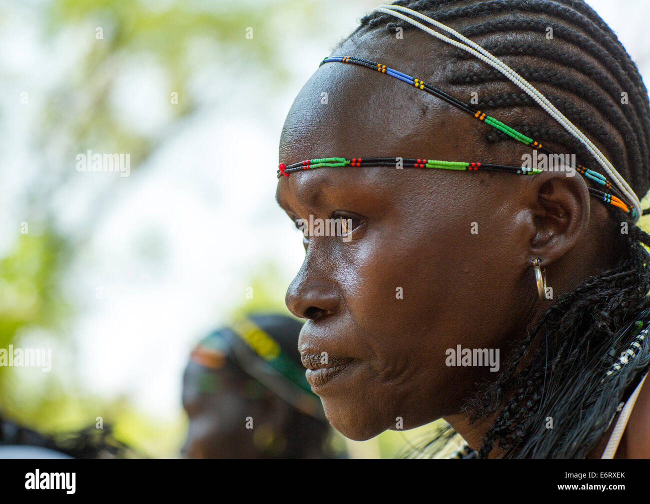 Woman From Anuak Tribe In Traditional Clothing, Gambela, Ethiopia Stock ...