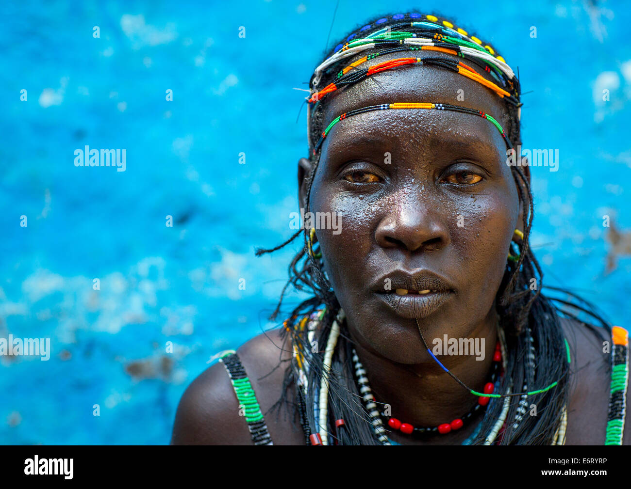 Woman From Anuak Tribe In Traditional Clothing, Gambela, Ethiopia Stock ...