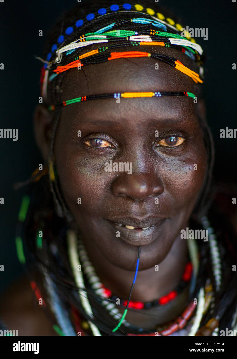 Woman From Anuak Tribe In Traditional Clothing, Gambela, Ethiopia Stock ...