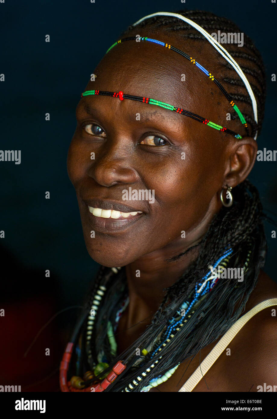 Woman From Anuak Tribe In Traditional Clothing, Gambela, Ethiopia Stock ...
