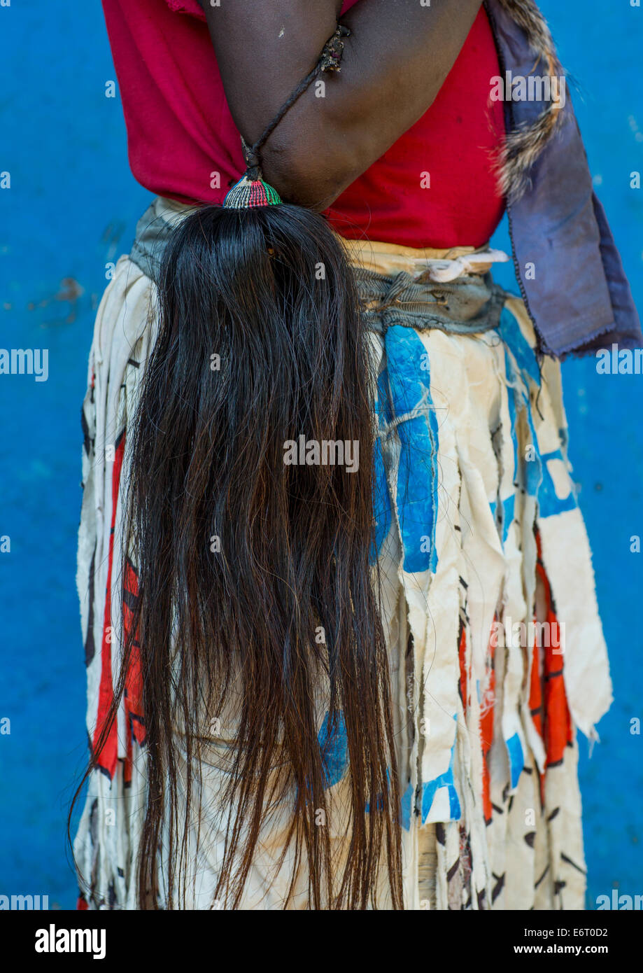Man From Anuak Tribe In Traditional Clothing Holding A Flyswatter ...