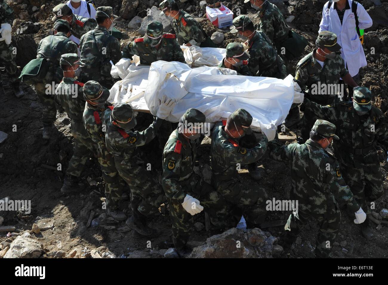 Fuquan, China's Guizhou Province. 30th Aug, 2014. Soldiers carry the ...