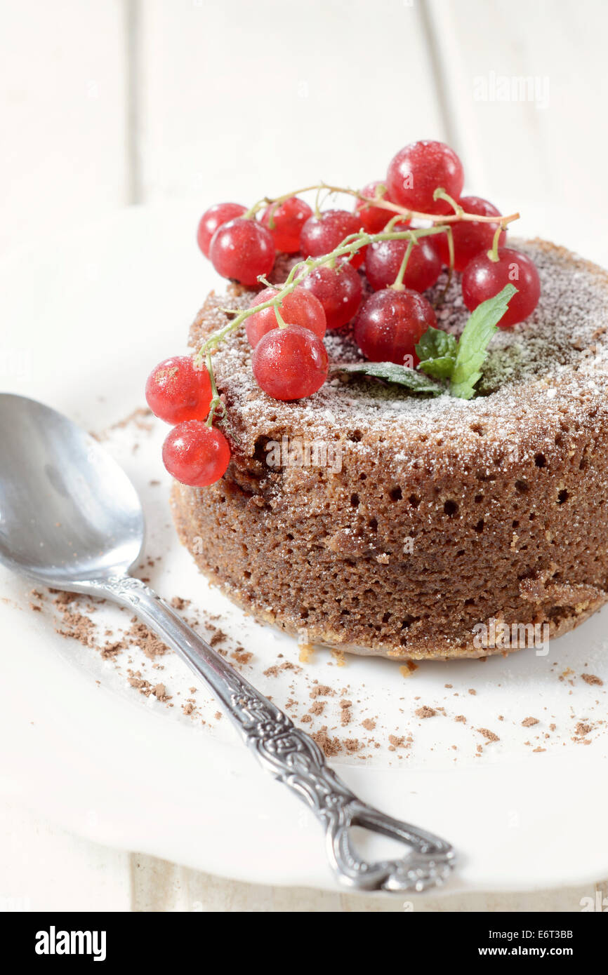 Hot lava cake in the plate on wooden background Stock Photo - Alamy