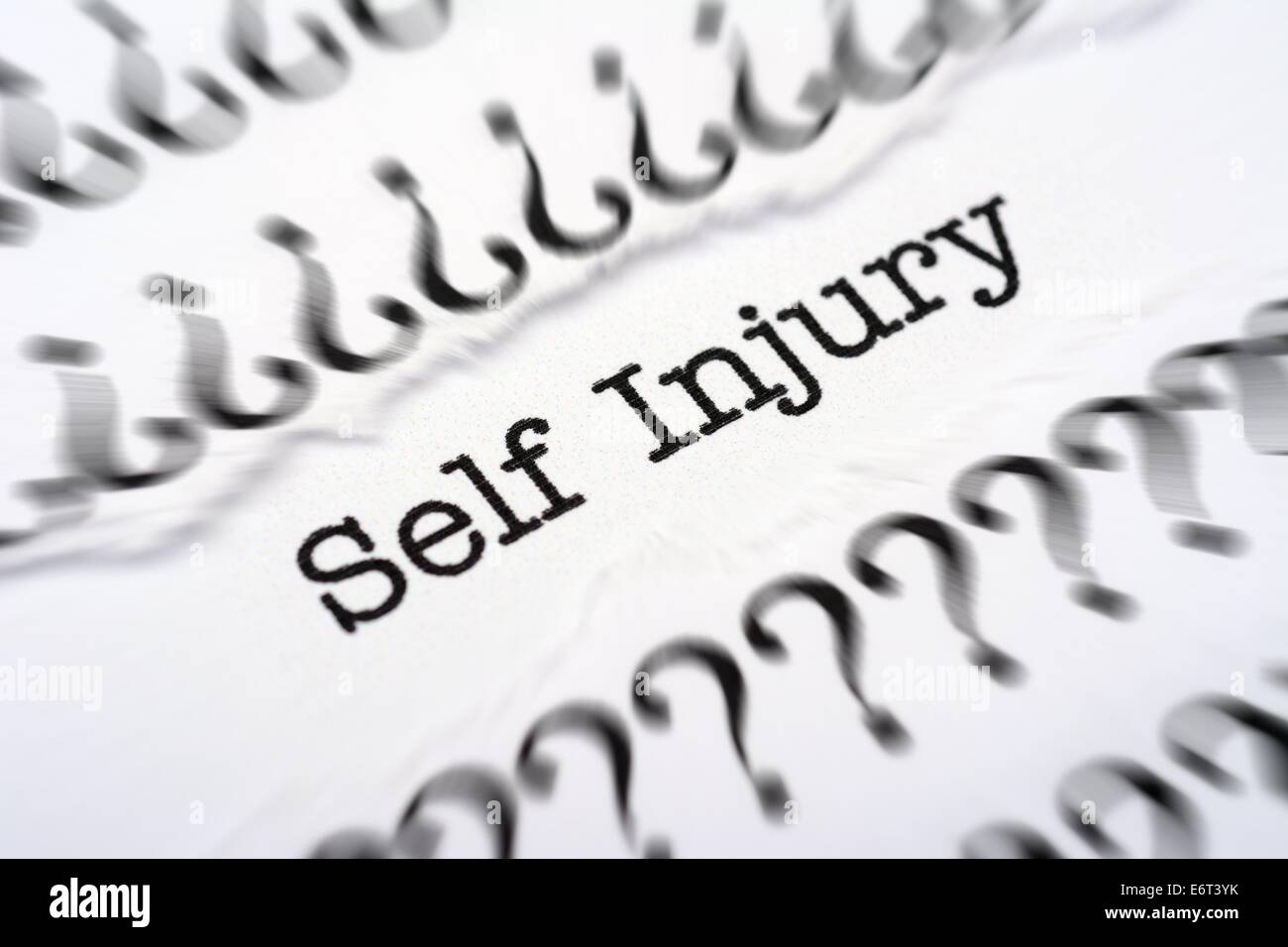 Self injury text Stock Photo - Alamy
