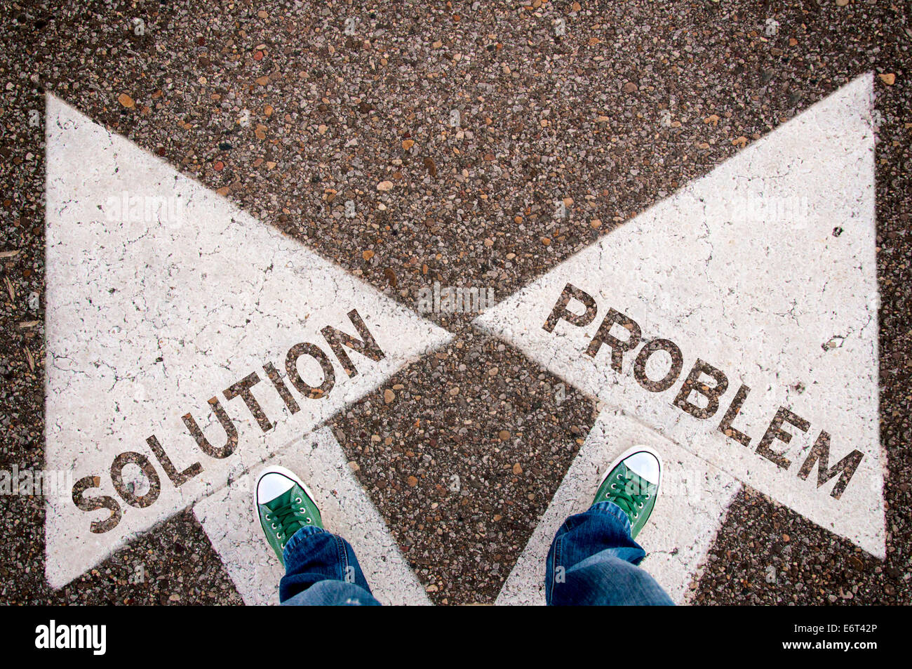 Solution and problem dilemma concept with man legs from above standing ...