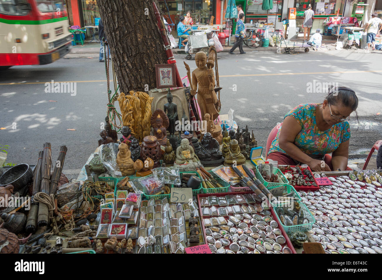 Buddhist amulets for sale at the Tha Prachan Amulet Market in Bangkok ...