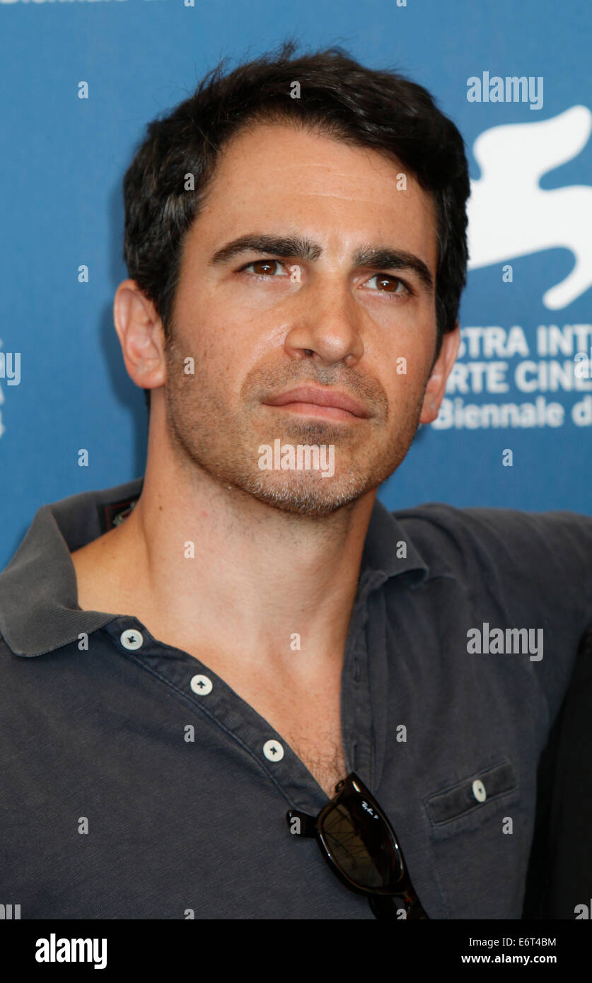 Venice, Italy. 30th Aug, 2014. Actor Chris Messina poses at the ...
