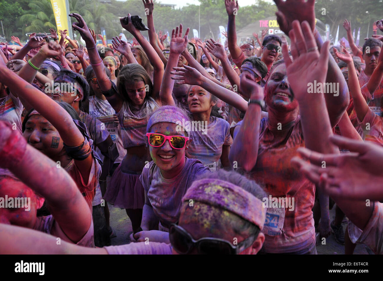 Singapore. 30th Aug, 2014. People participate in the Color Run on Singapore's Sentosa Island on ...