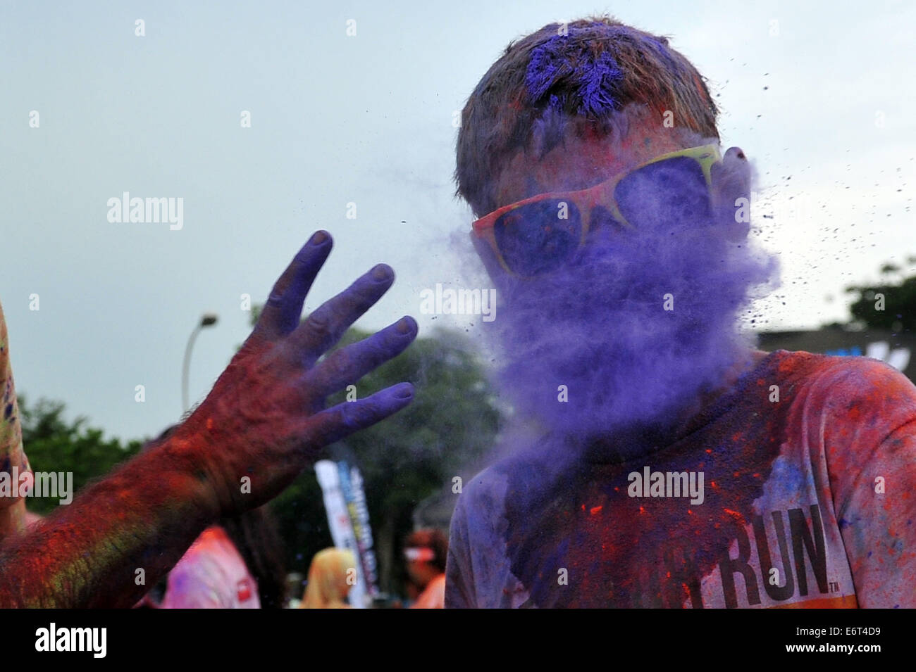 Singapore. 30th Aug, 2014. People participate in the Color Run on Singapore's Sentosa Island on ...