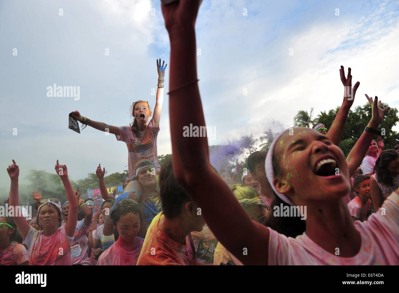 Singapore. 30th Aug, 2014. People participate in the Color Run on Singapore's Sentosa Island on ...