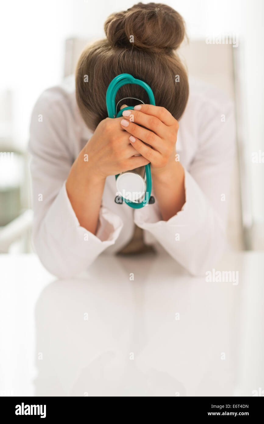 Portrait of stressed doctor woman Stock Photo - Alamy